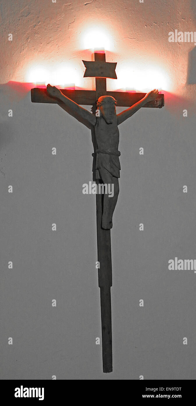 crucified with lit candles during the Christian religious ceremony ...