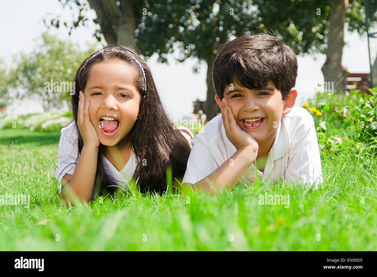 2 indian kids friends park enjoy Stock Photo - Alamy