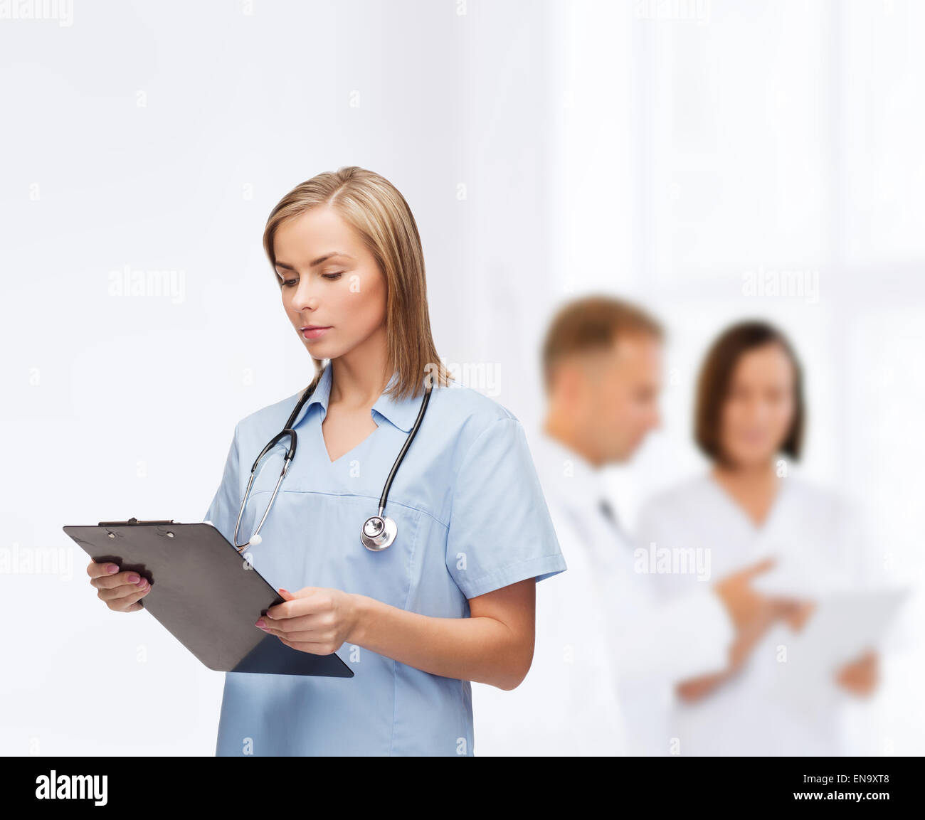 Busy hospital nurse hi-res stock photography and images - Alamy