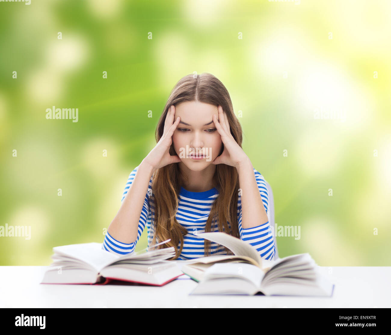 stressed student girl with books Stock Photo - Alamy
