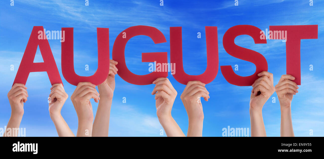 Hands Holding Red Straight Word August Blue Sky Stock Photo - Alamy