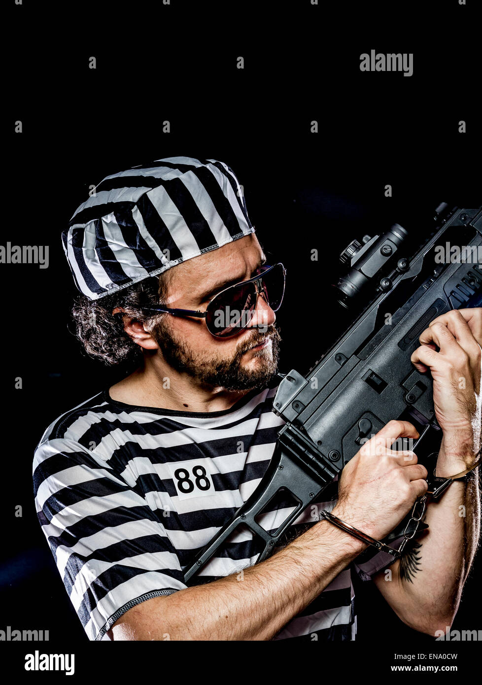 Security prison riot concept man holding hi-res stock photography and ...