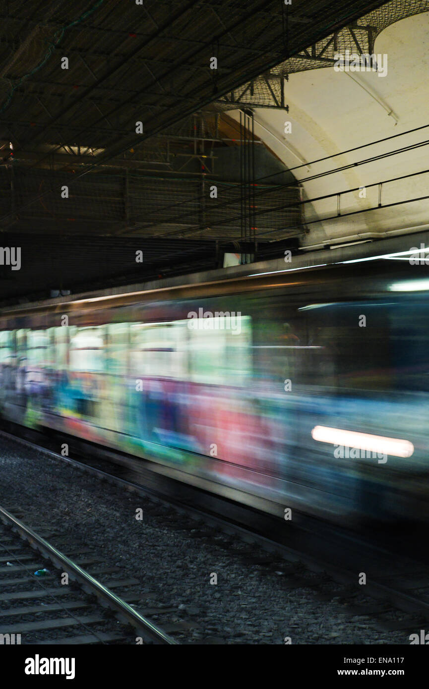 Moving subway passing through a station in Rome Stock Photo - Alamy
