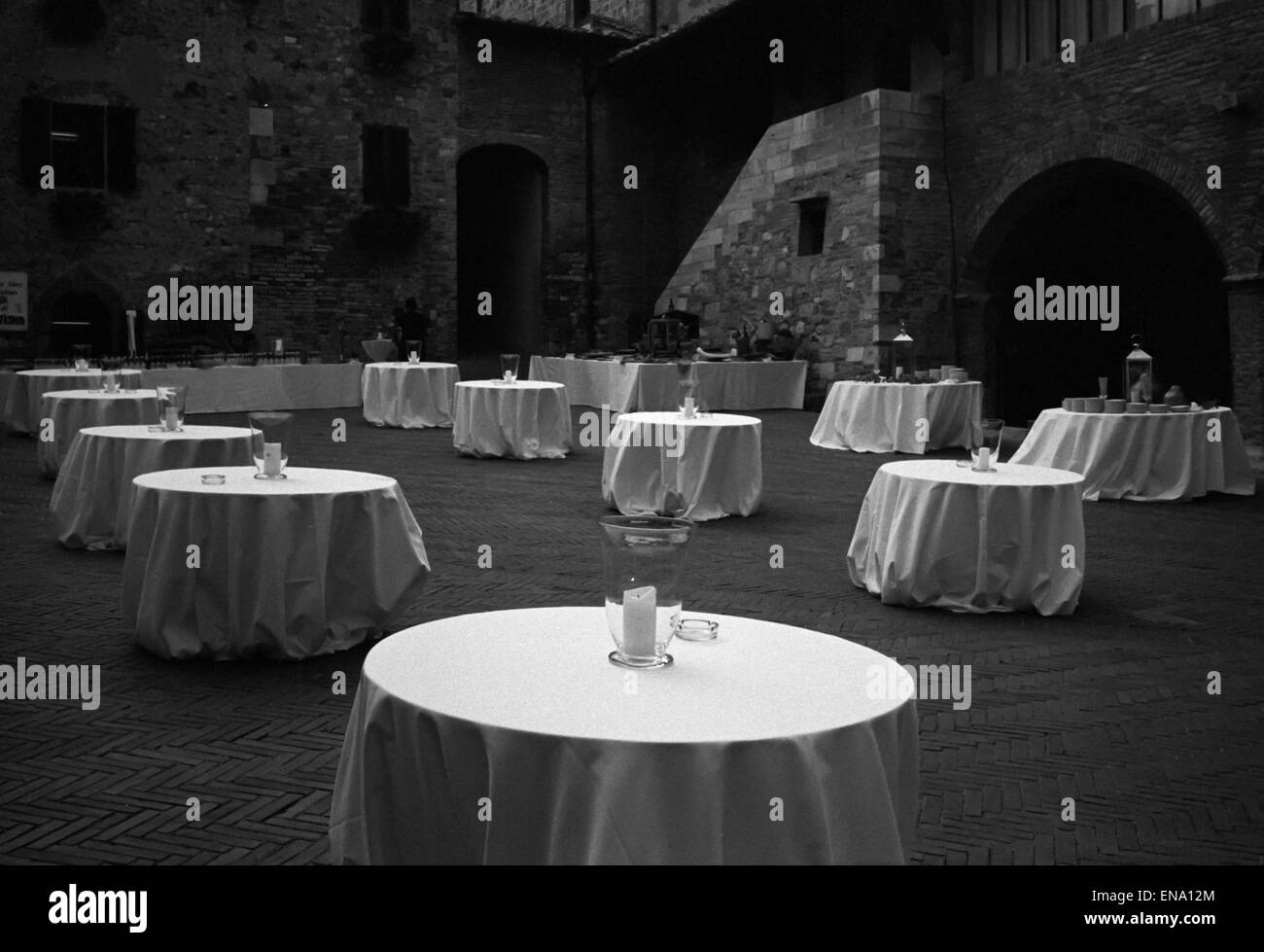 Several tables getting ready for a party Stock Photo - Alamy