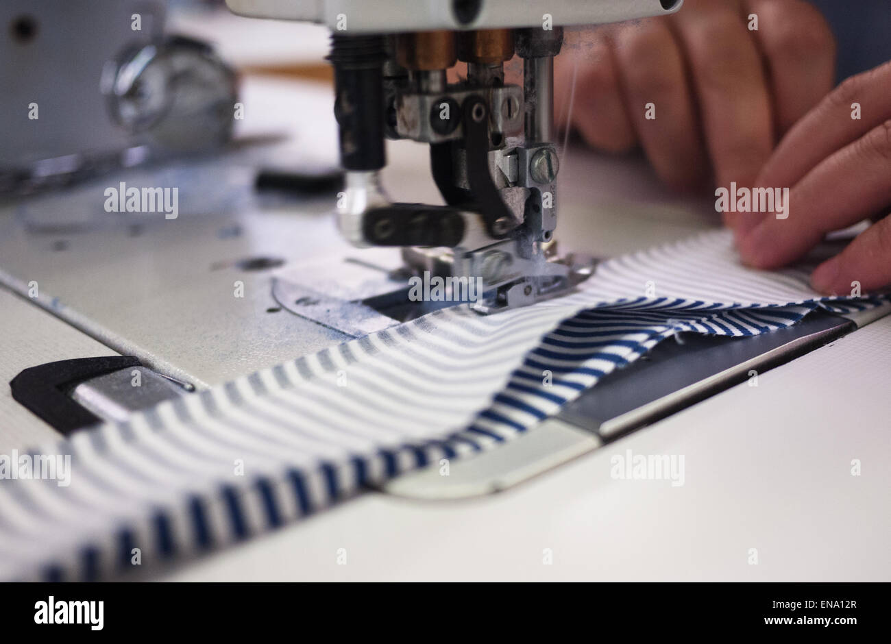 Sewing machine at work in a industrial environment Stock Photo - Alamy