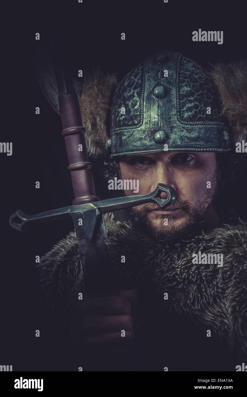 Leadership, Costume, Viking warrior with a huge sword and helmet with ...