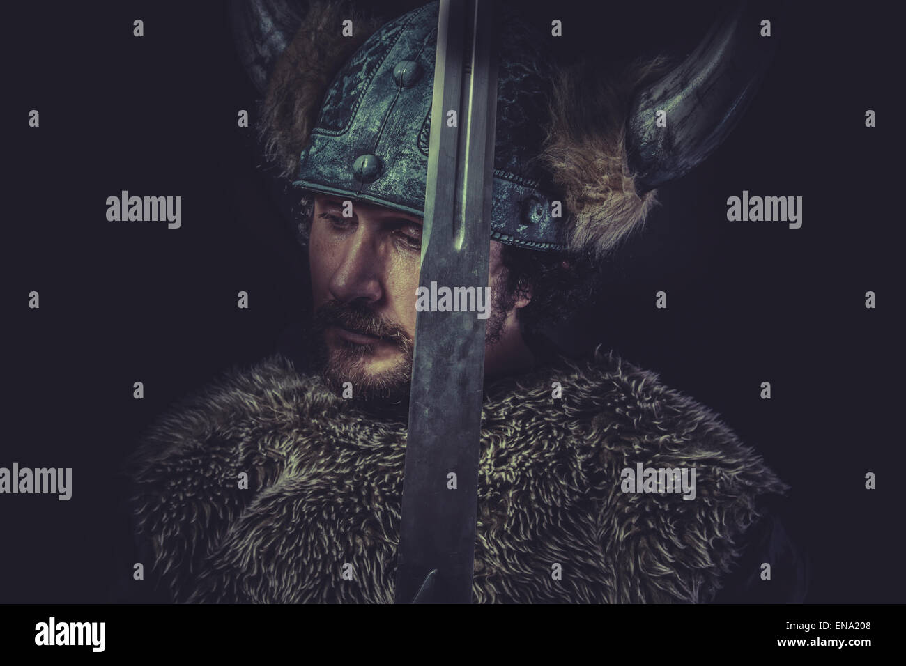 Costume, Viking warrior with a huge sword and helmet with horns Stock ...