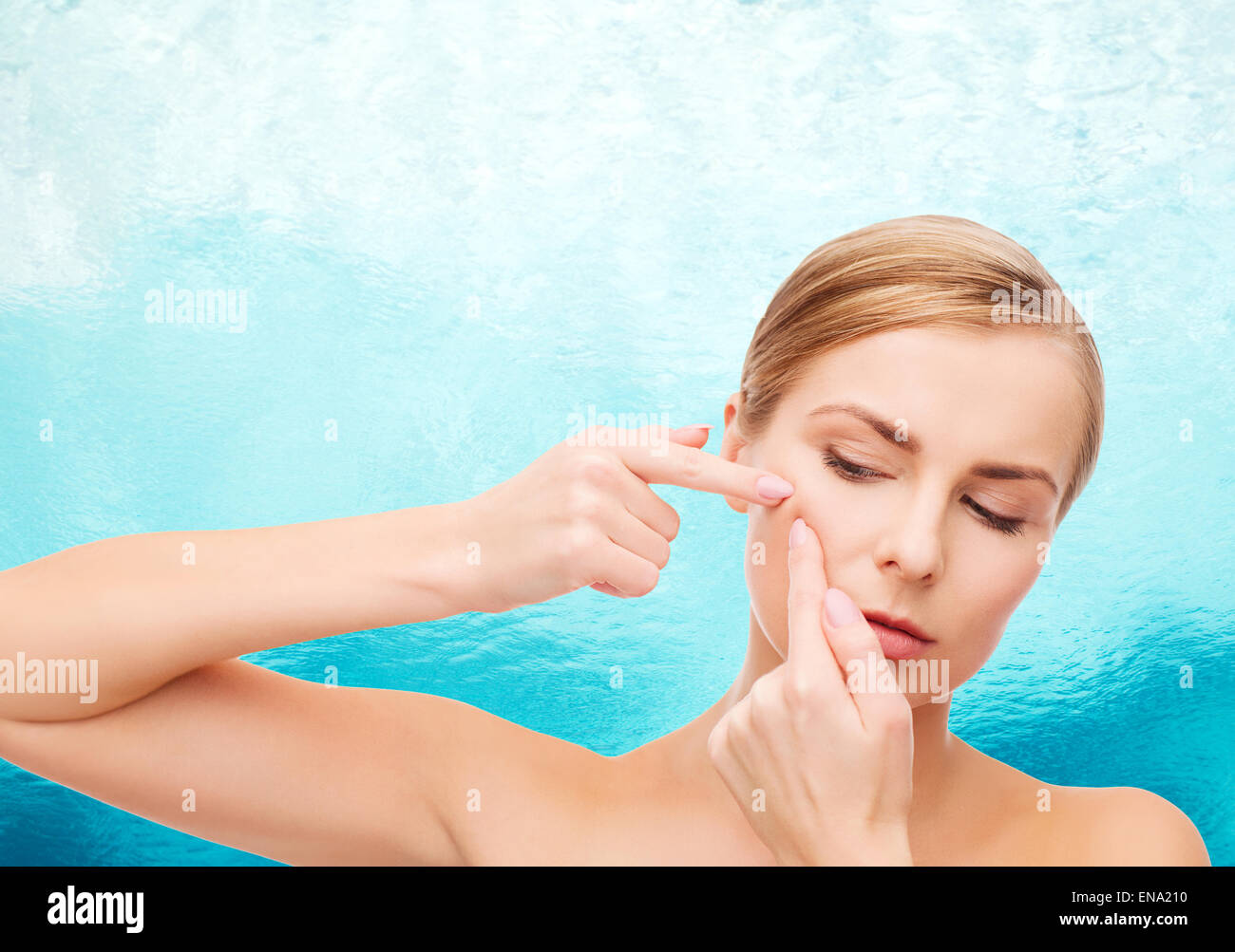 Squeezing spots hi-res stock photography and images - Alamy