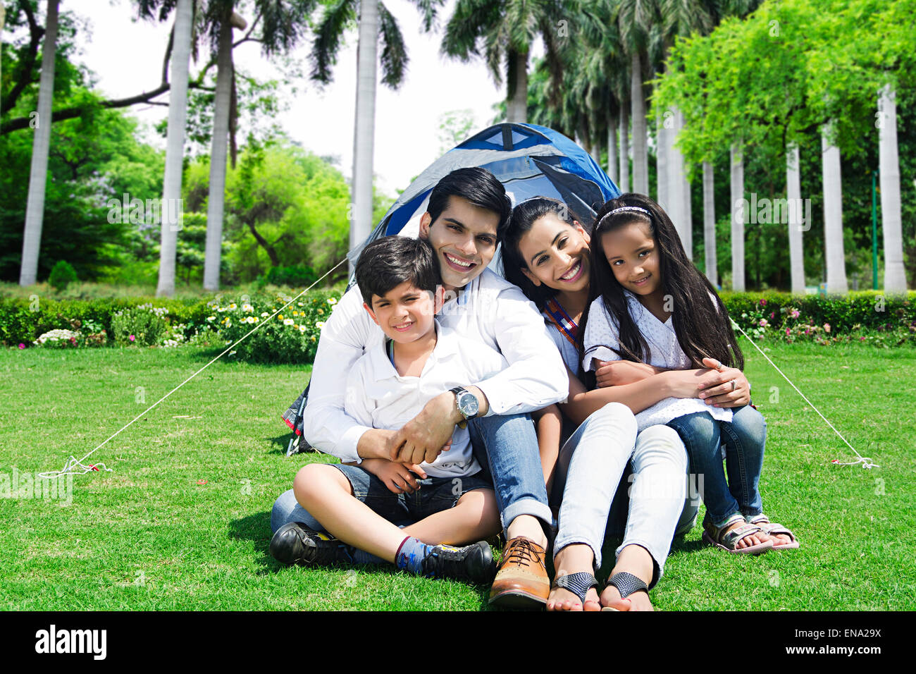 Indian parents kids sitting enjoy hi-res stock photography and images ...