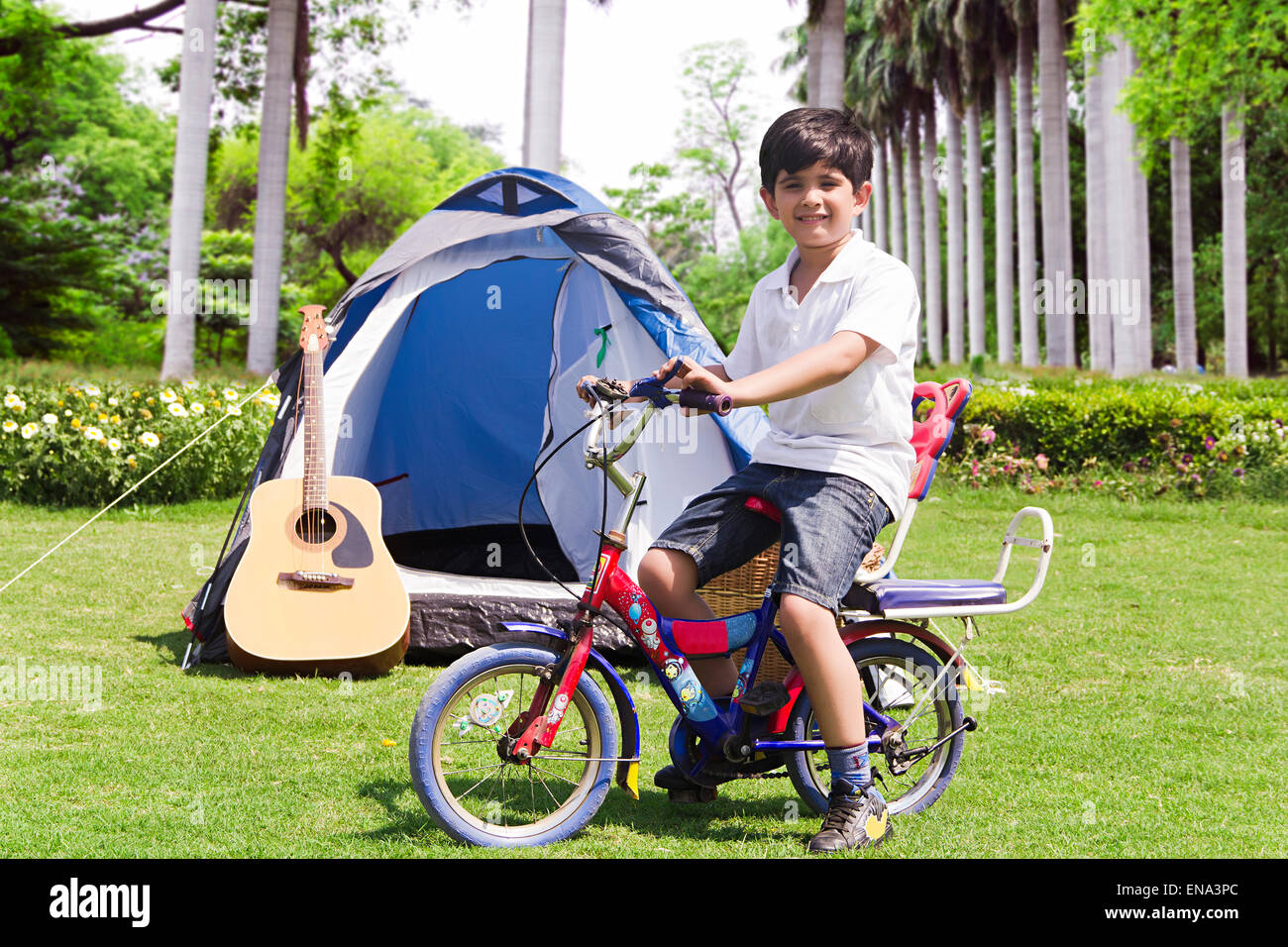 1 indian boy kid park Riding Cycle Stock Photo - Alamy