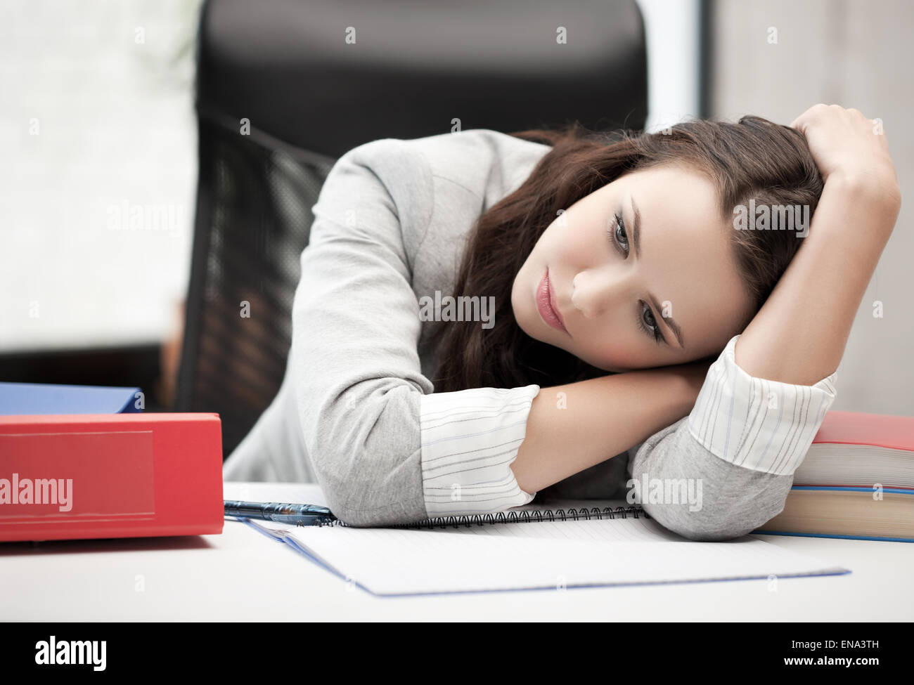 bored and tired woman behid the table Stock Photo - Alamy