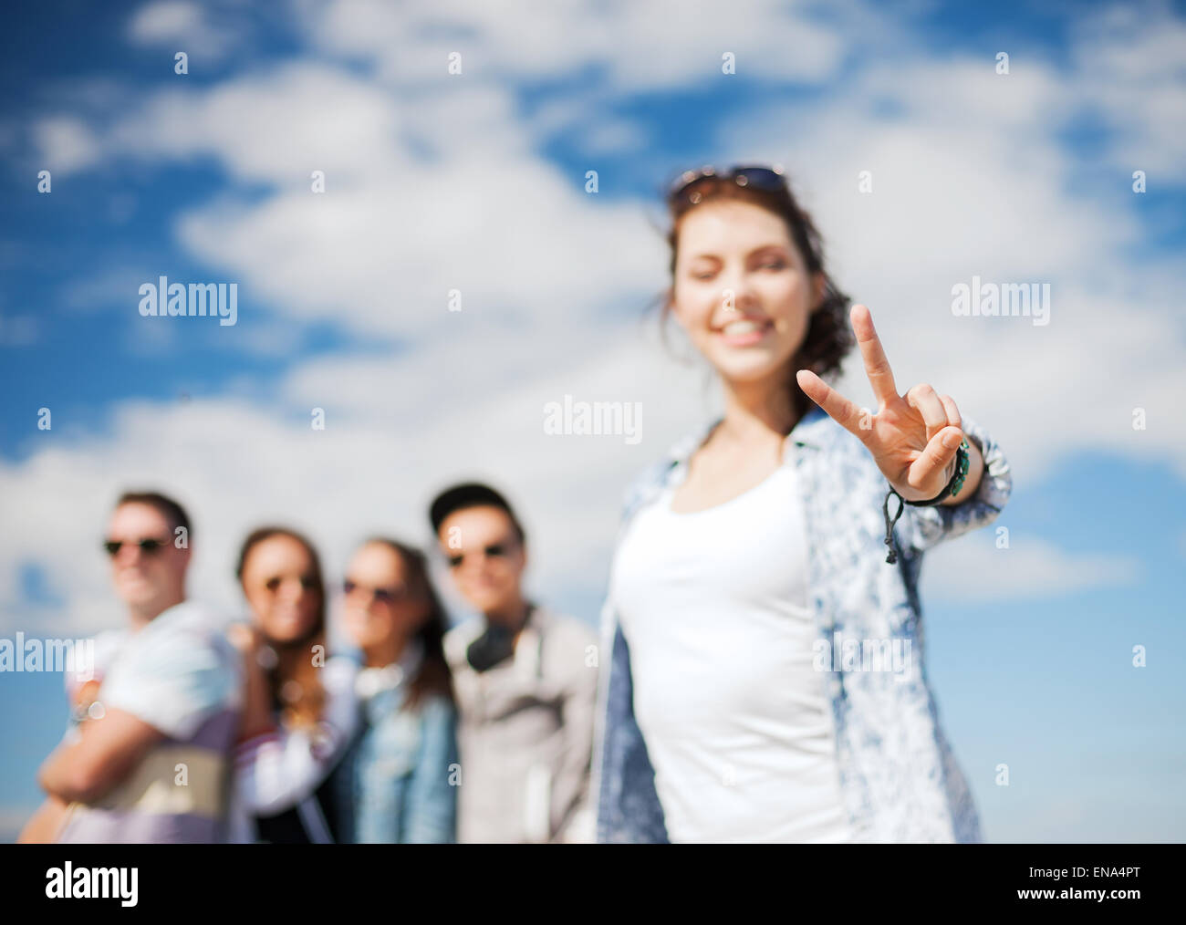 closeup of female hand showing v-sign with fingers Stock Photo - Alamy