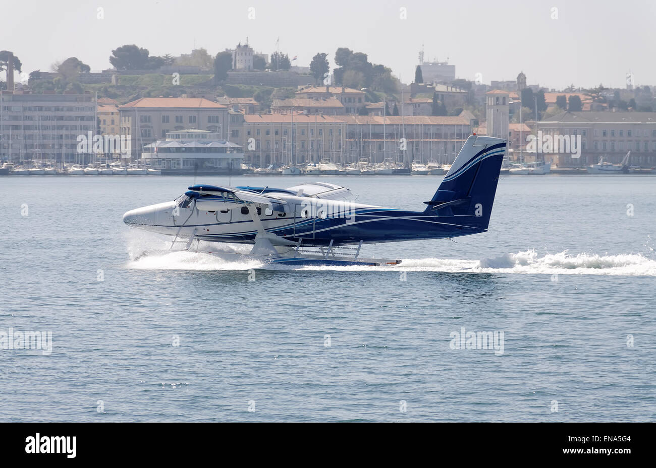seaplane landing on sea surface Stock Photo - Alamy