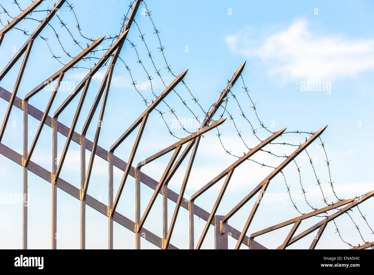 Barbed wire protection in the private area Stock Photo - Alamy