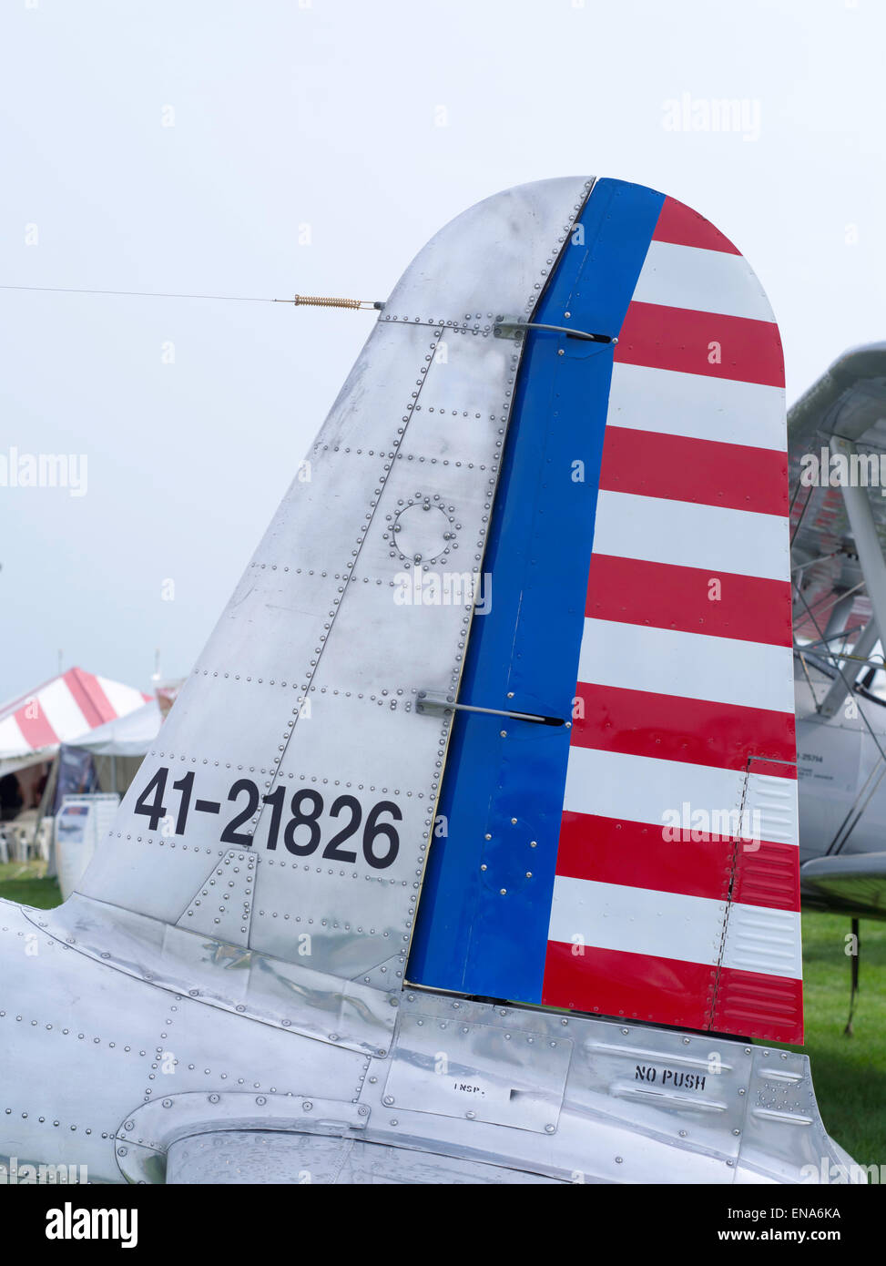 Photograph of an unidentied tail end of an aircraft at the EAA ...