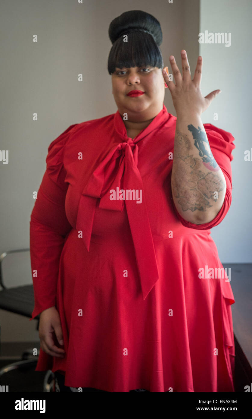 Manhattan, New York, USA. 29th Apr, 2015. Loni Tate, 31, of Harlem ...