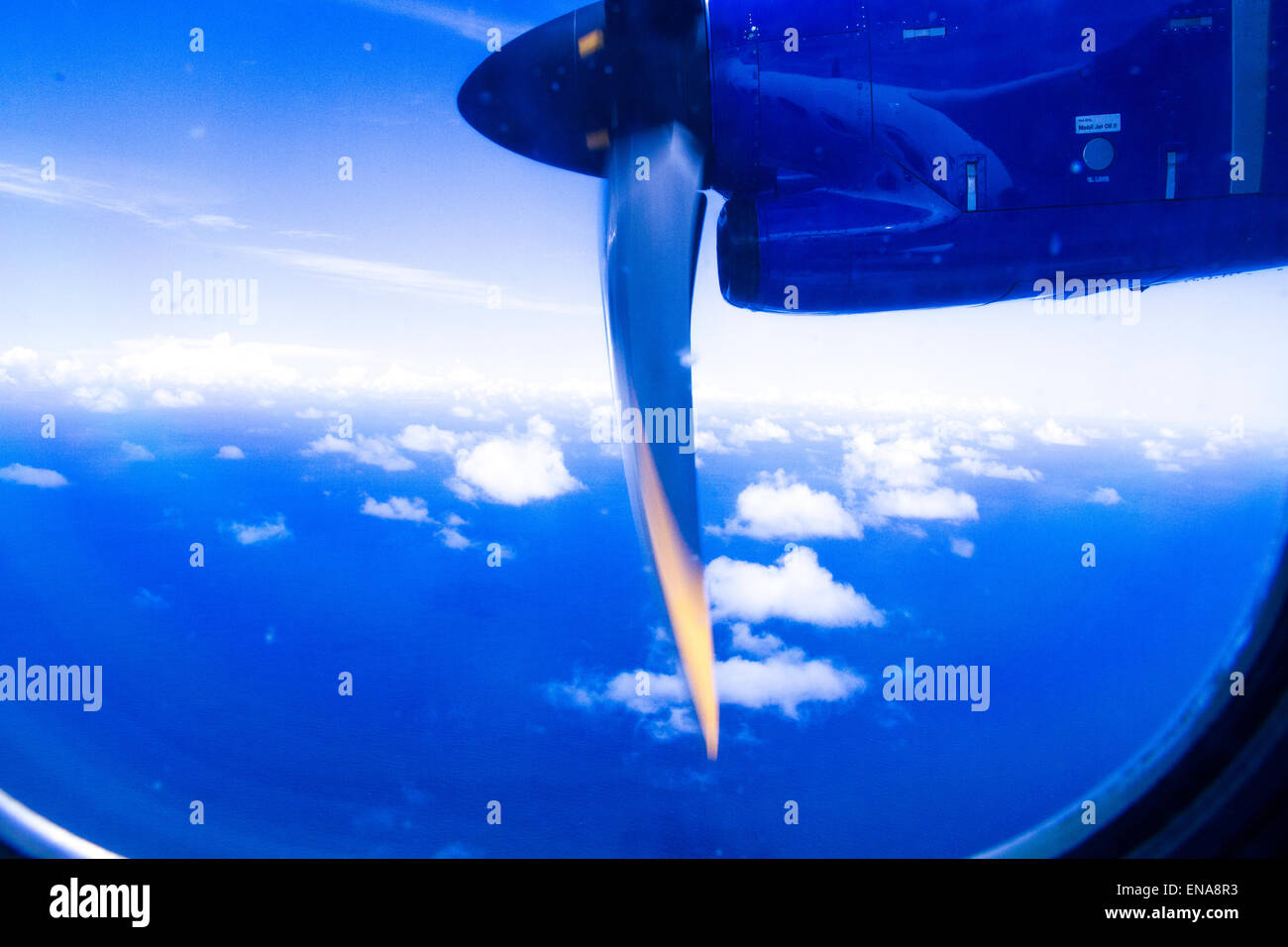 Engine cowling and propeller seen through rain spattered window Stock ...