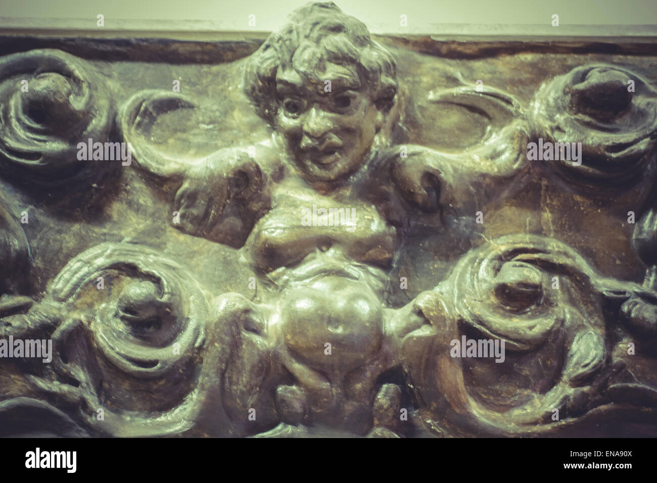 stone relief with figures inside a church Stock Photo - Alamy