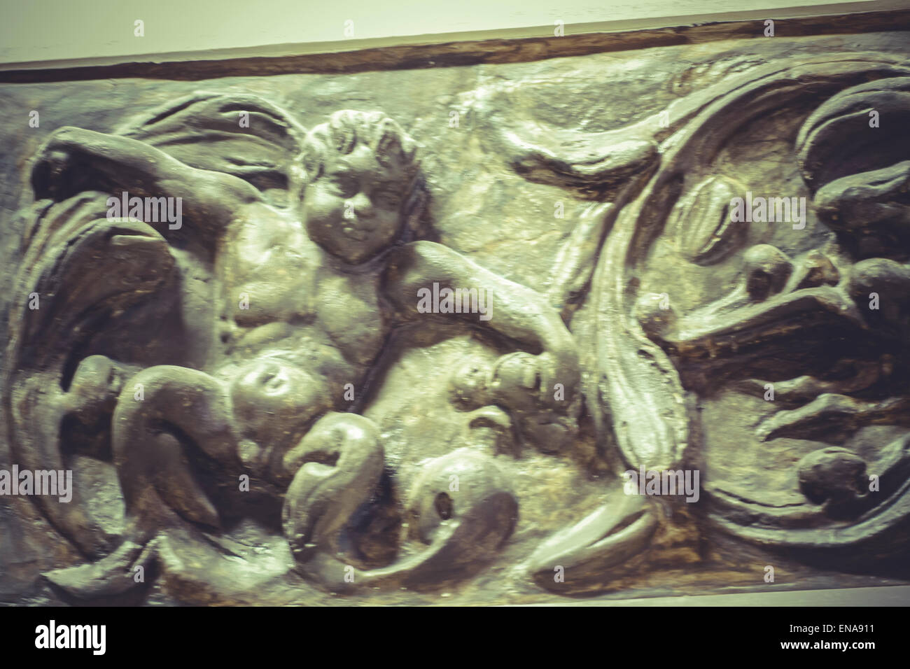 stone relief with figures inside a church Stock Photo - Alamy