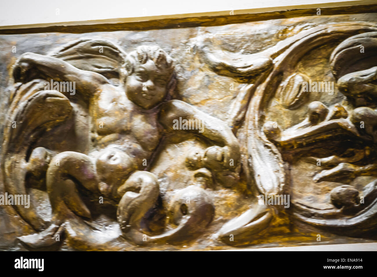 stone relief with figures inside a church Stock Photo - Alamy