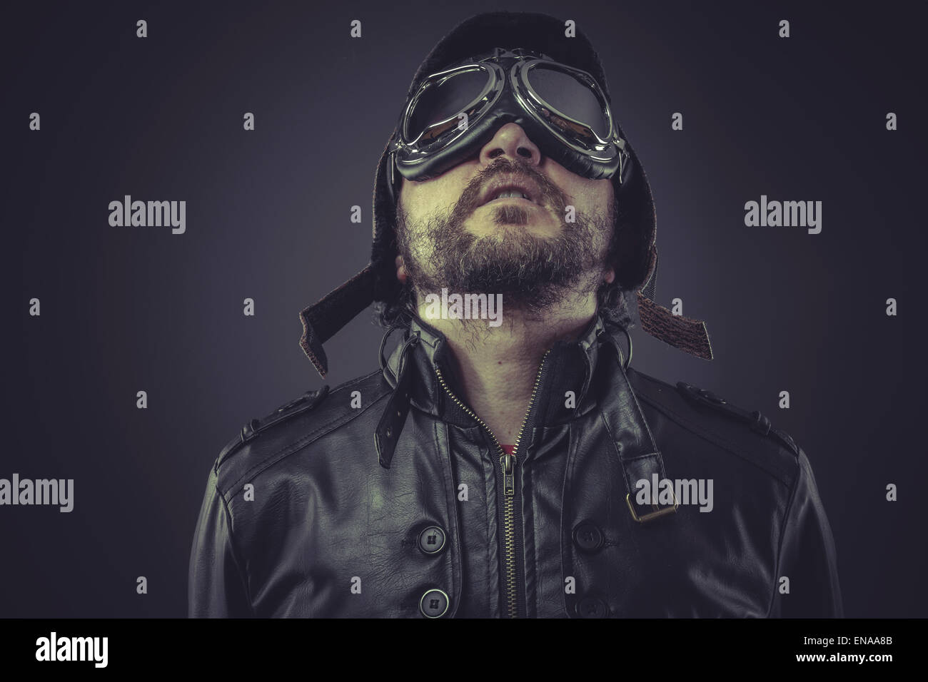 retro pilot dressed in vintage style leather cap and goggles Stock ...