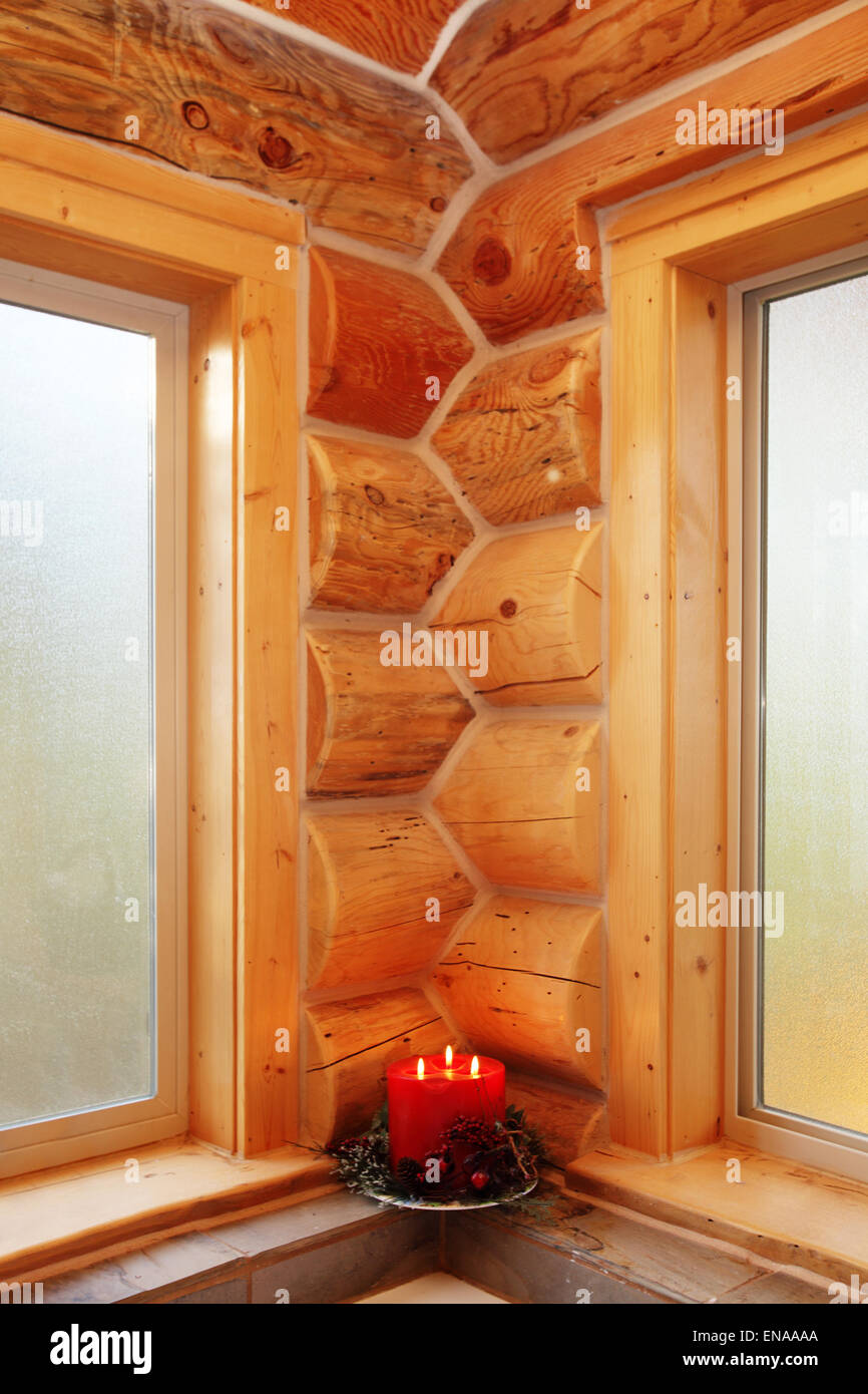 The Scandinavian saddle notch corner joint in a modern log home Stock ...