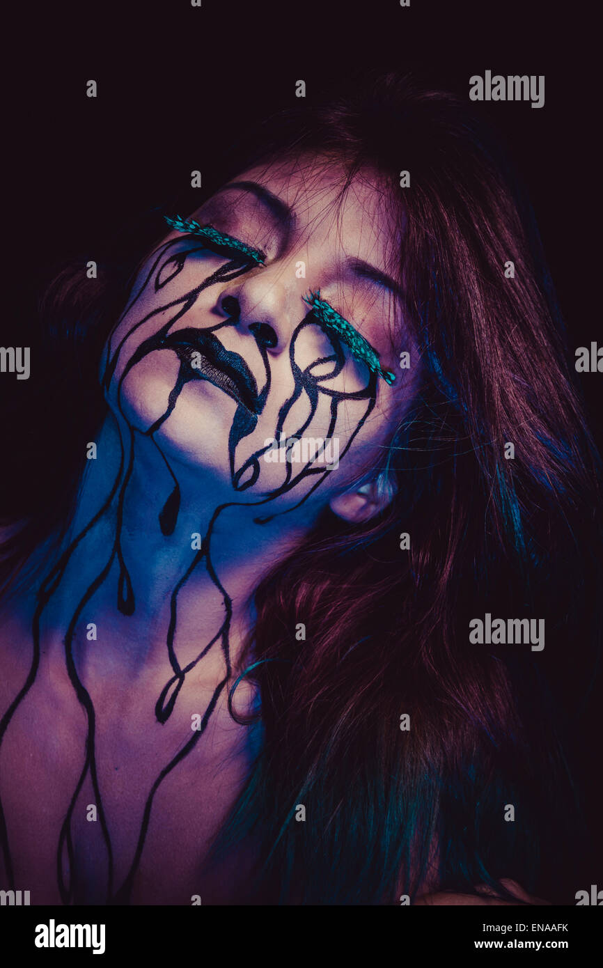 concept, crying woman with tears and makeup dark light Stock Photo - Alamy