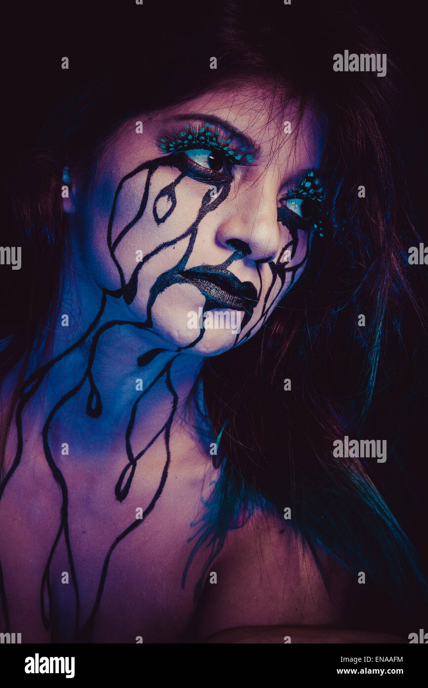 concept, crying woman with tears and makeup dark light Stock Photo - Alamy
