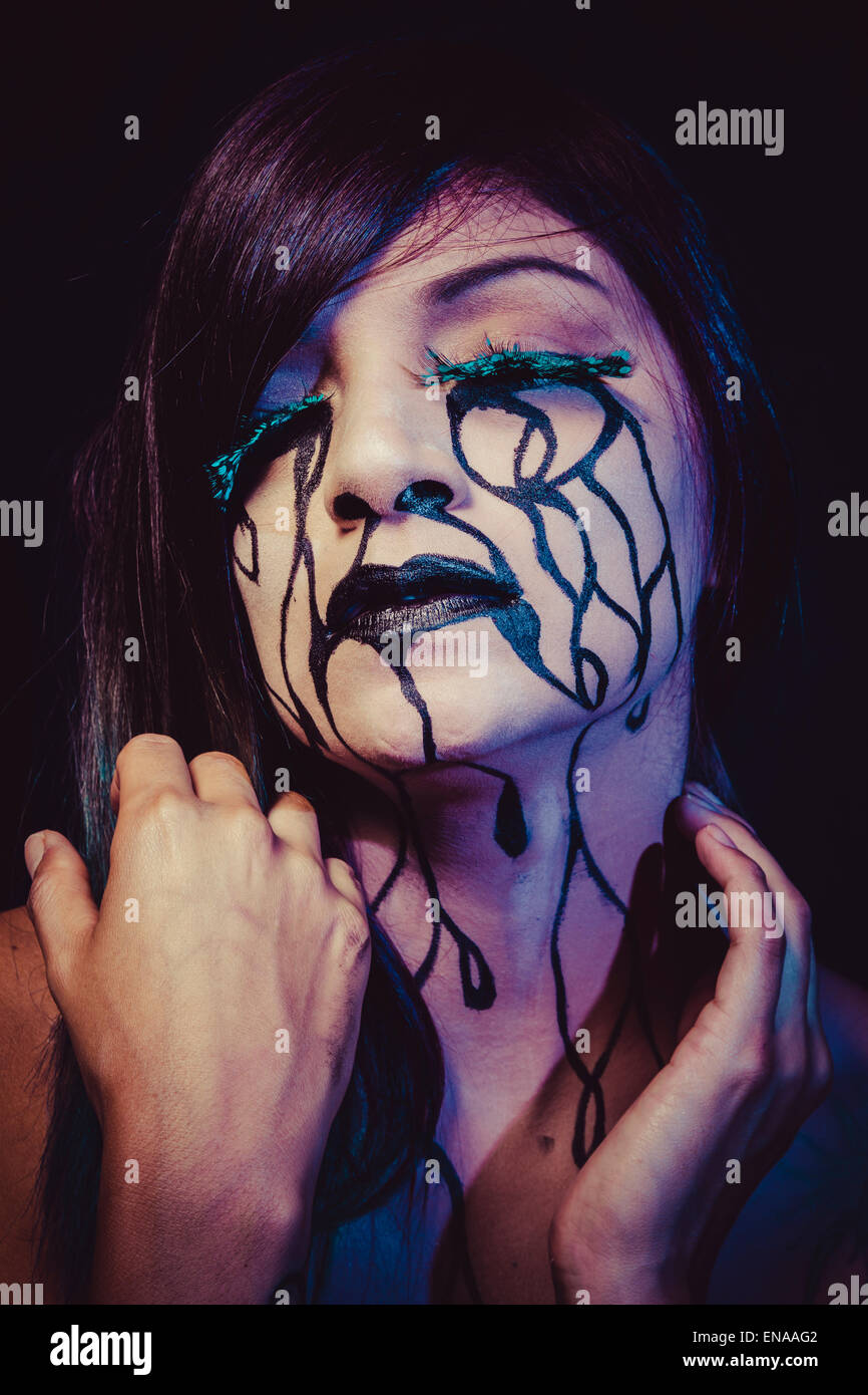 concept, crying woman with tears and makeup dark light Stock Photo - Alamy