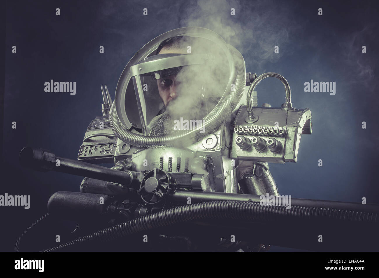 spaceship, sspaceman in silver armor and huge cannon Stock Photo - Alamy