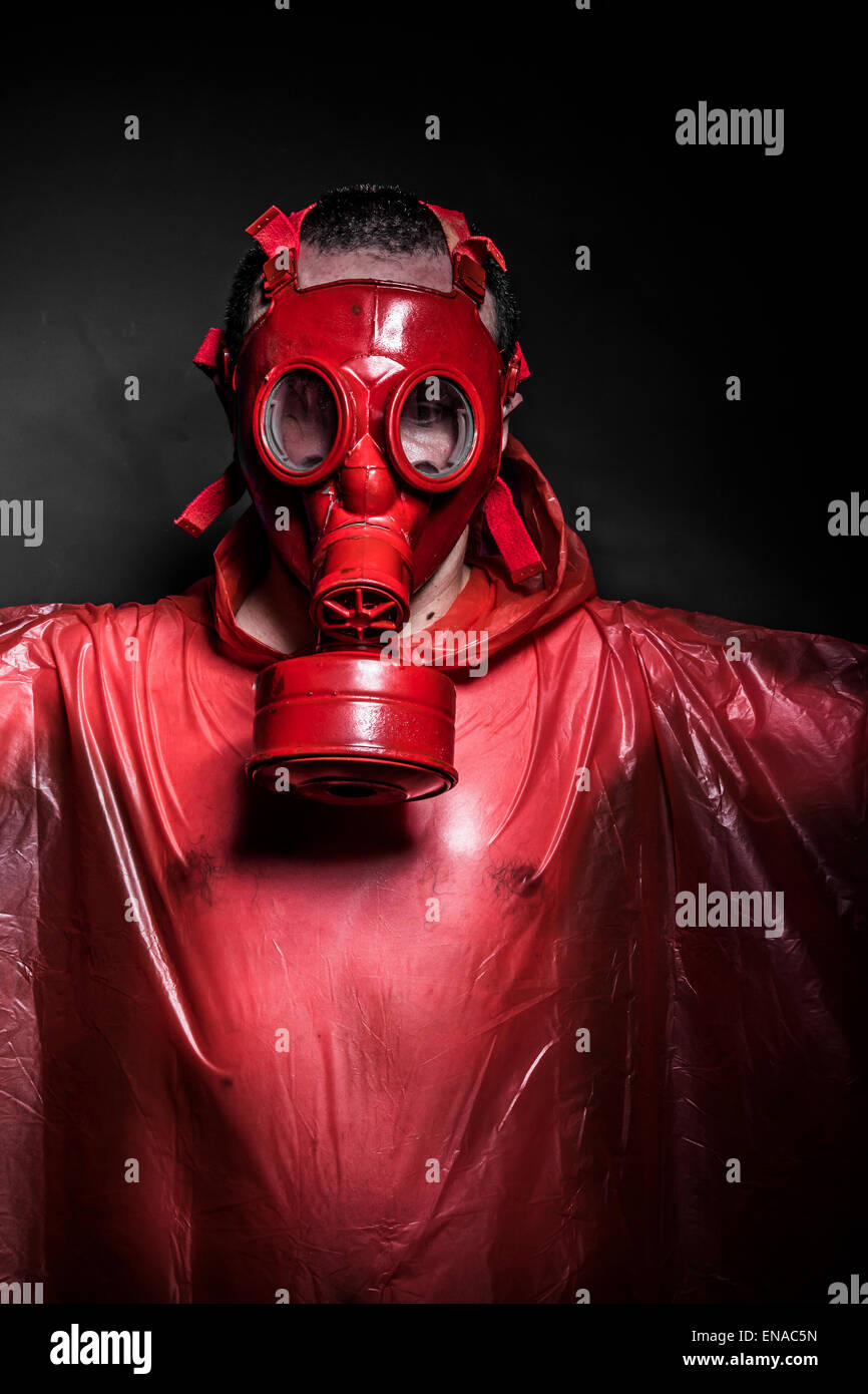 inhalation nuclear concept, man with red gas mask Stock Photo - Alamy