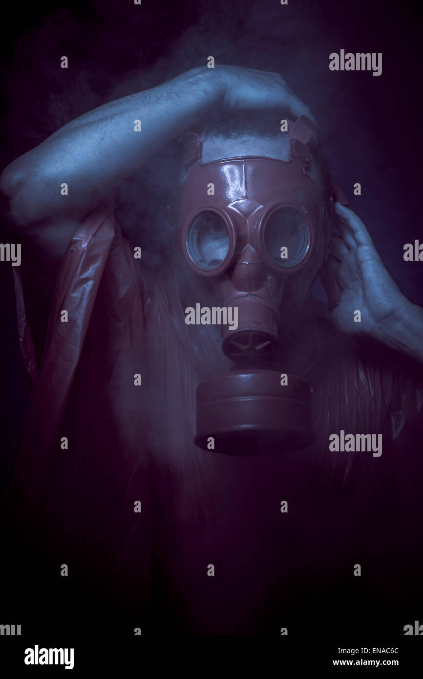 Ebola infection concept, man with red gas mask Stock Photo - Alamy