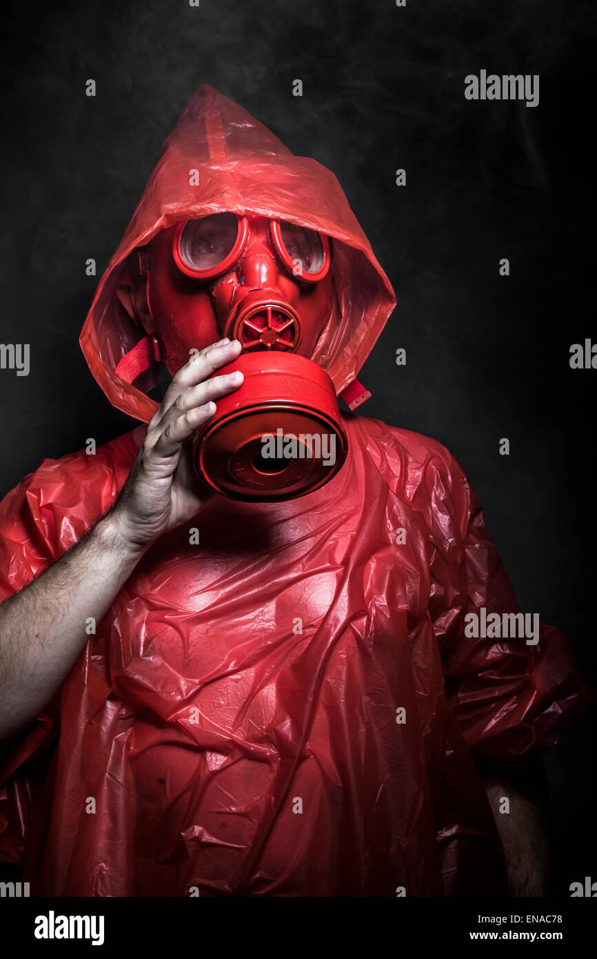atomic nuclear concept, man with red gas mask Stock Photo - Alamy