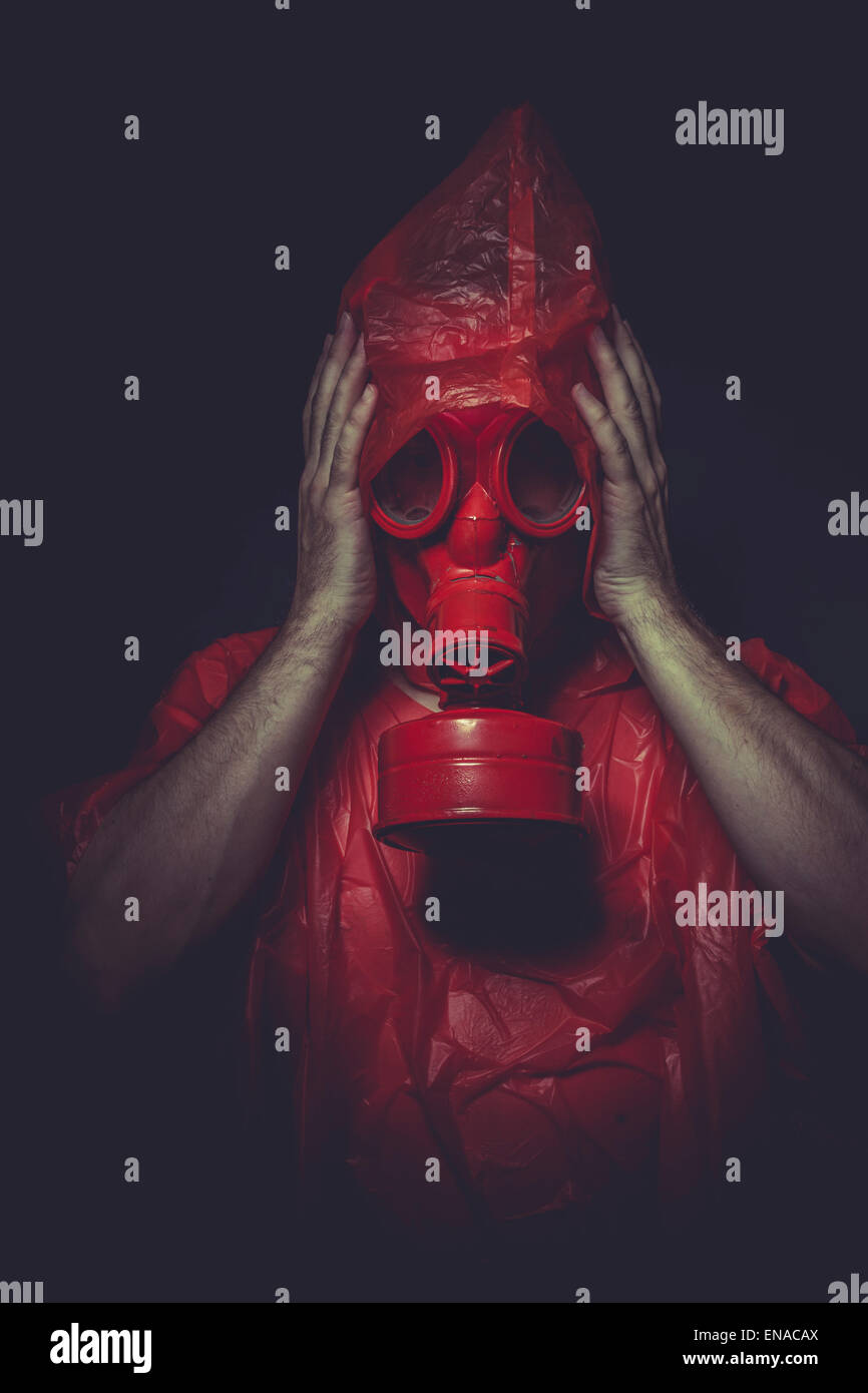 Ebola infection concept, man with red gas mask Stock Photo - Alamy