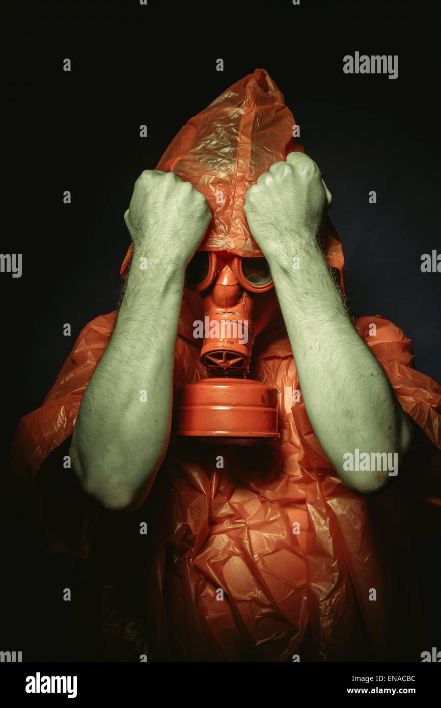 Ebola infection concept, man with red gas mask Stock Photo - Alamy