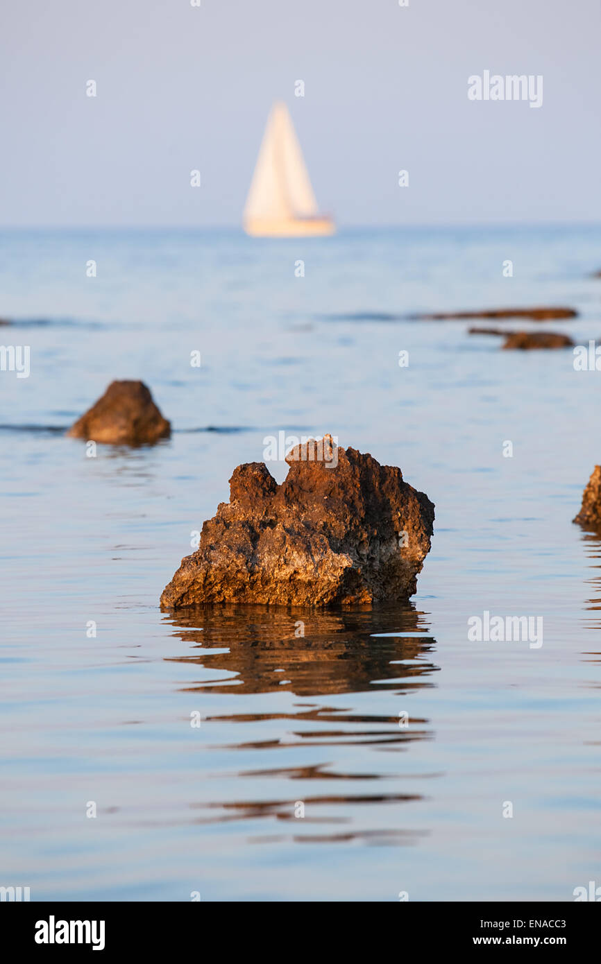 Ship behind the rocks hi-res stock photography and images - Alamy