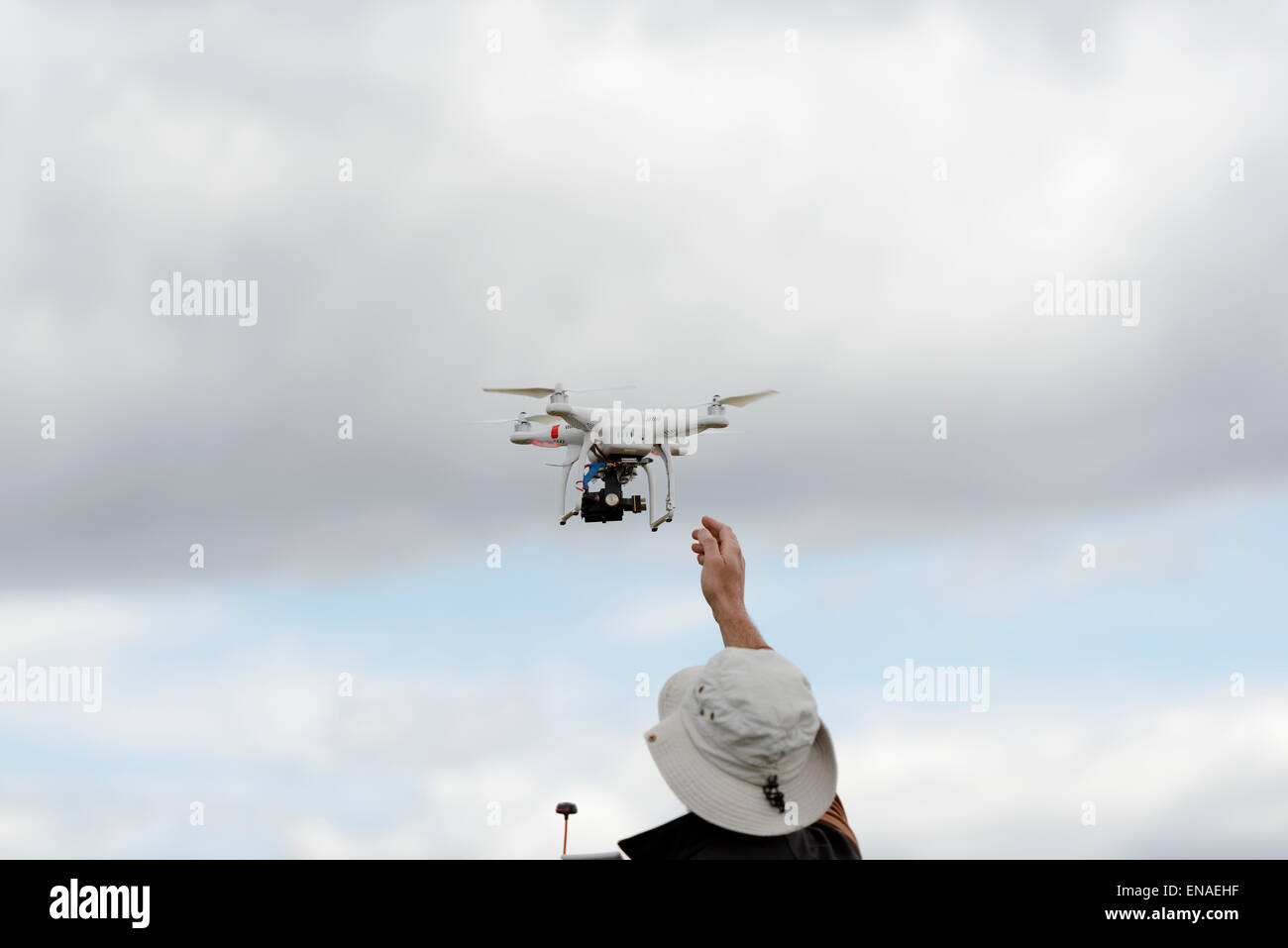 Small consumer drone flying (DJI Innovations Phantom 2 Stock Photo - Alamy
