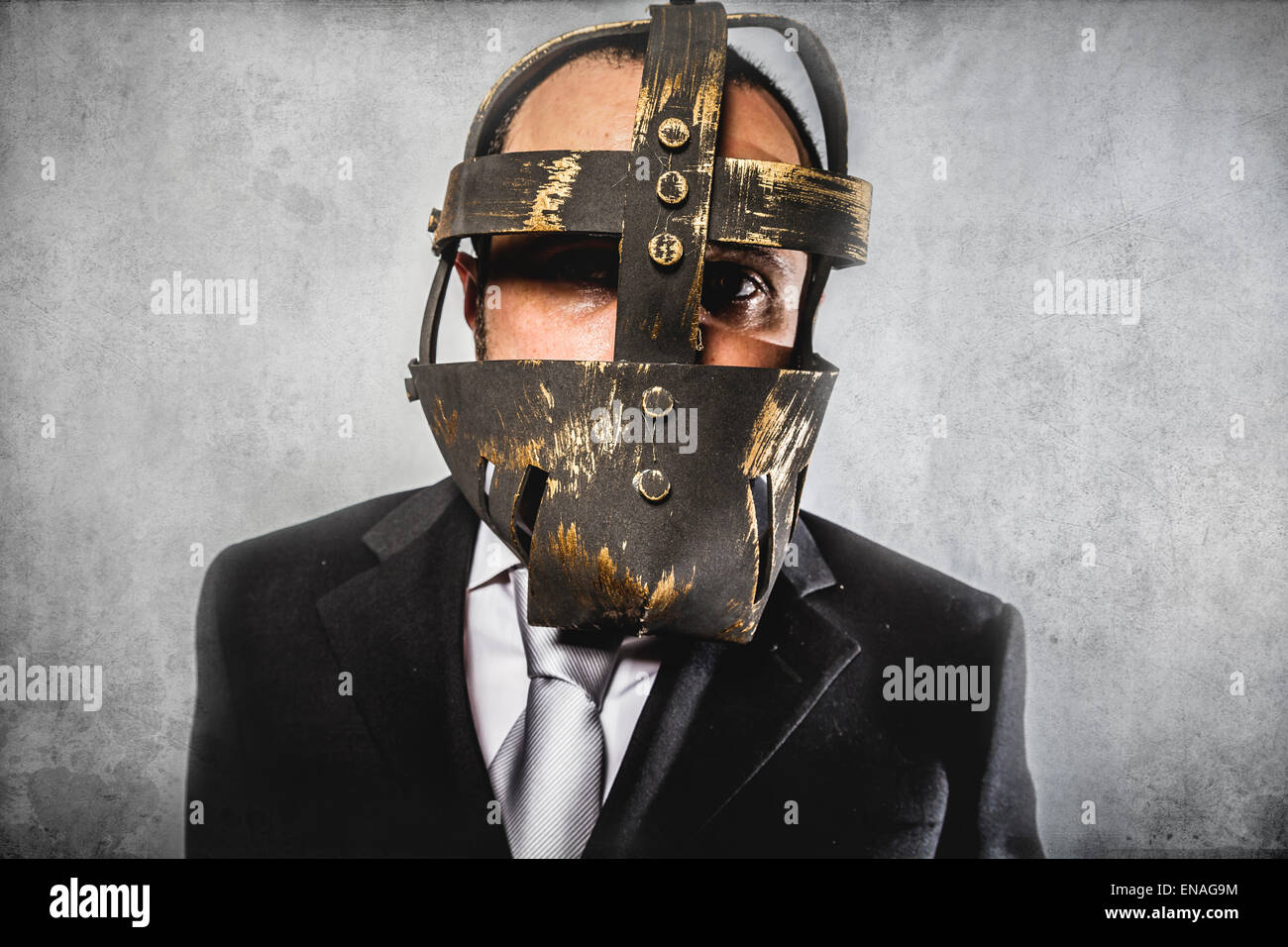 dangerous business man with iron mask and expressions Stock Photo - Alamy