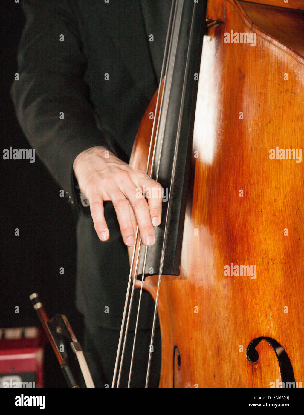 Double bass being played Stock Photo - Alamy