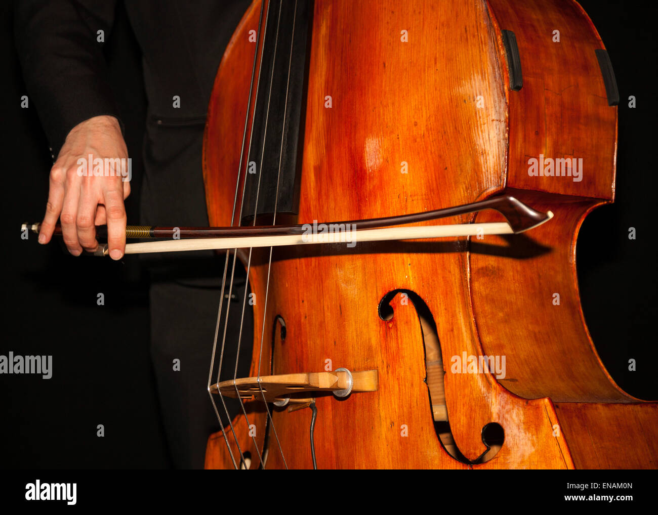 Double bass being played Stock Photo - Alamy