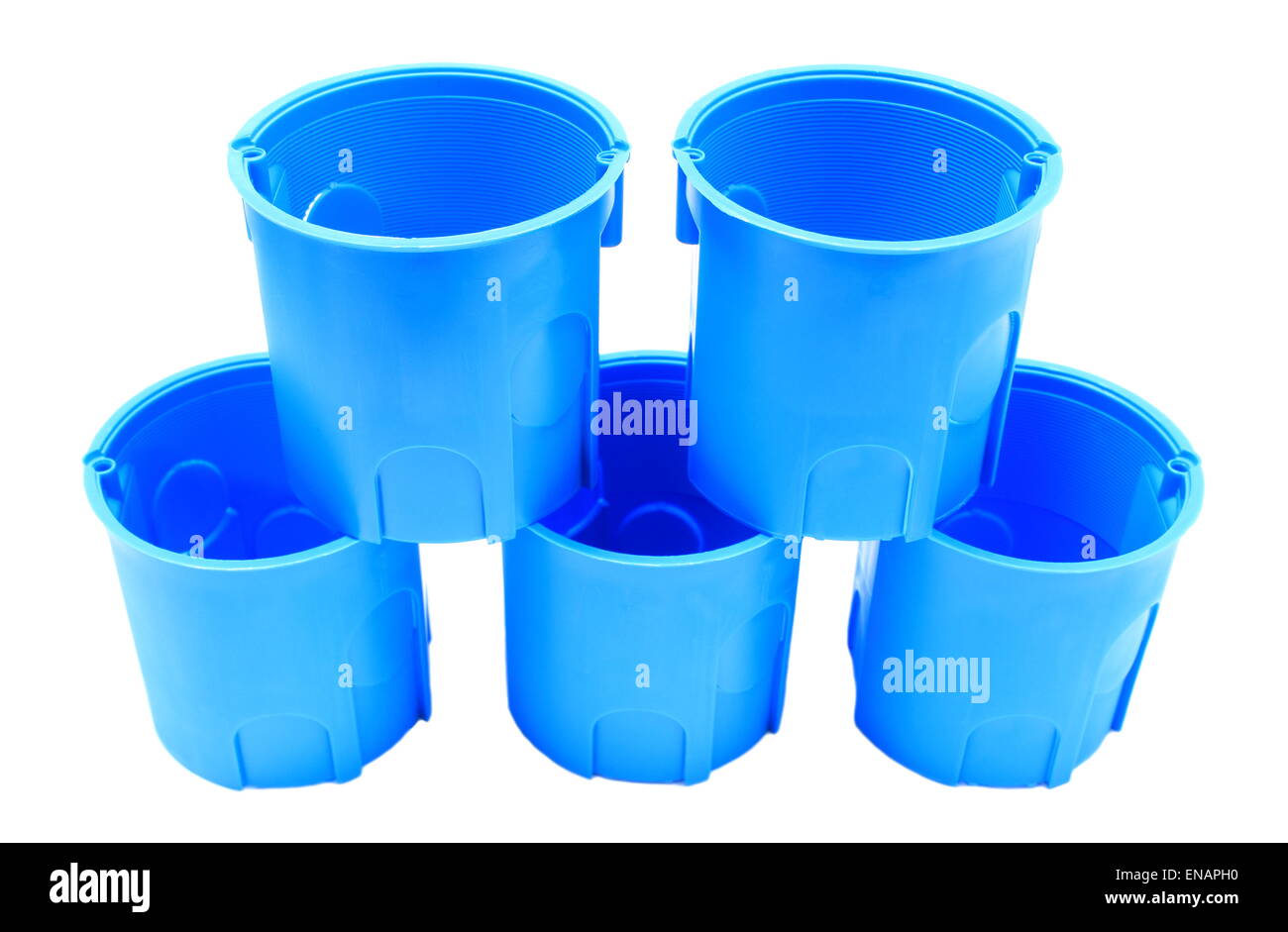 Stack of blue plastic electrical boxes on white background, junction ...