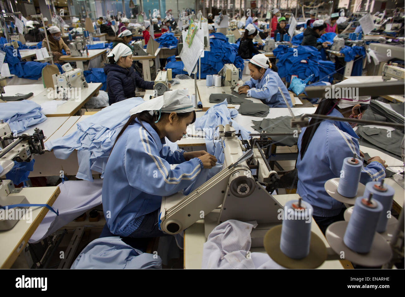 working conditions in a clothing factory in Vietnam Stock Photo - Alamy