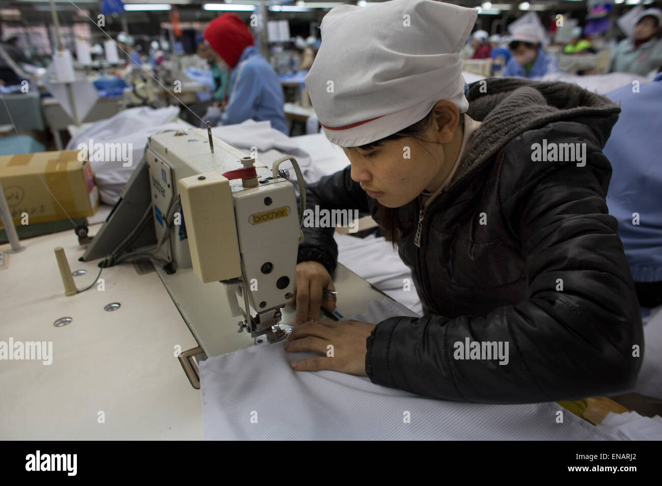 working conditions in a clothing factory in Vietnam Stock Photo - Alamy