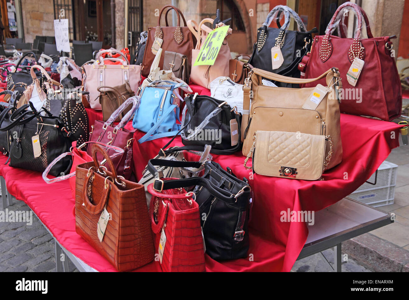 Handbags on sale on stall in market, Montblanc, Catalonia, Spain Stock ...