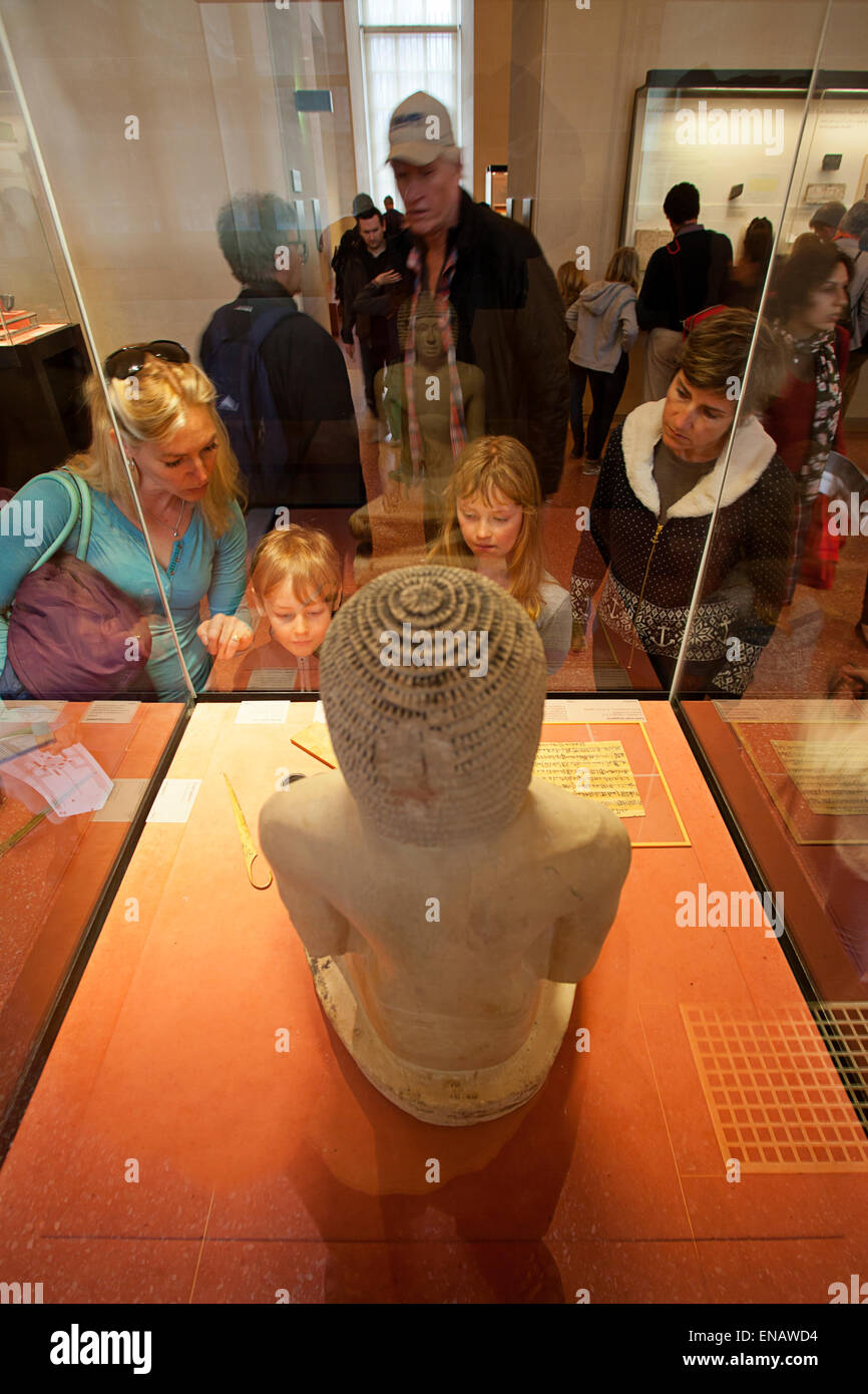Ancient Egyptian limestone sculpture of seated scribe Stock Photo - Alamy