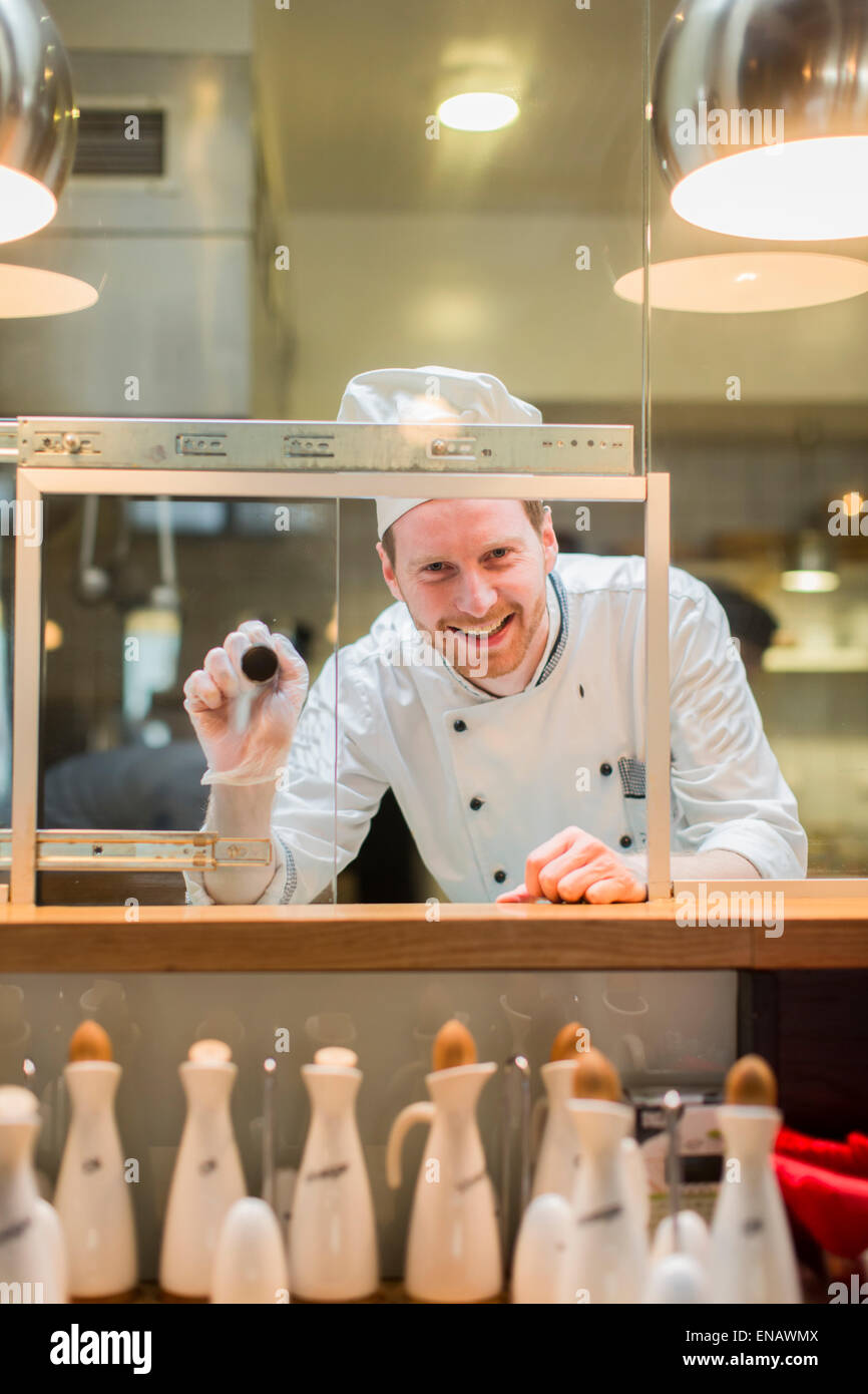 Chef in the restaurant Stock Photo - Alamy
