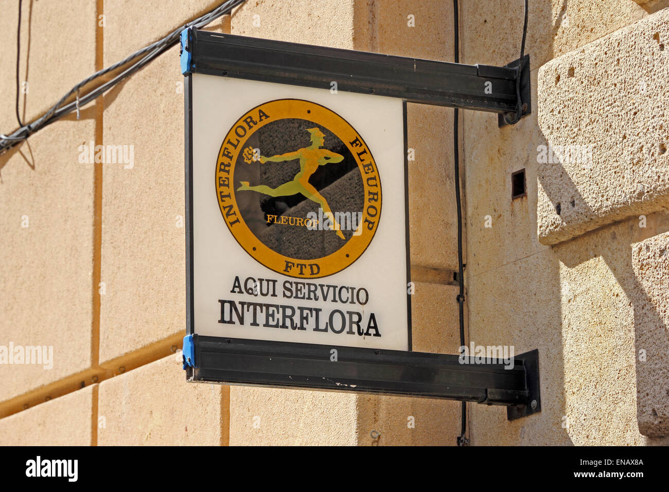 Interflora sign outside florist shop, Tarragona Stock Photo - Alamy
