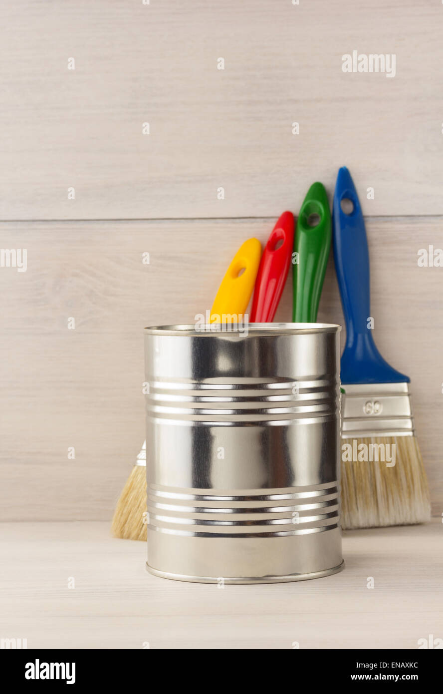 paint bucket and paintbrush on wooden background Stock Photo - Alamy
