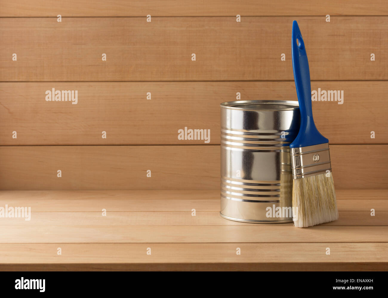 paint bucket and paintbrush on wooden background Stock Photo - Alamy