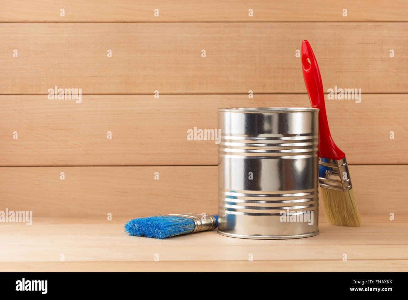 paint bucket and paintbrush on wooden background Stock Photo - Alamy